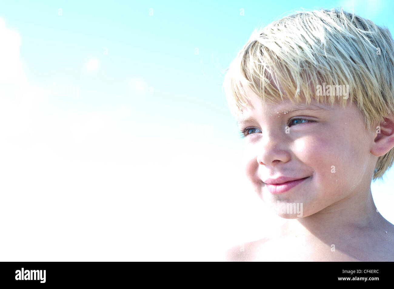 A little boy looks toward the ocean Stock Photo - Alamy