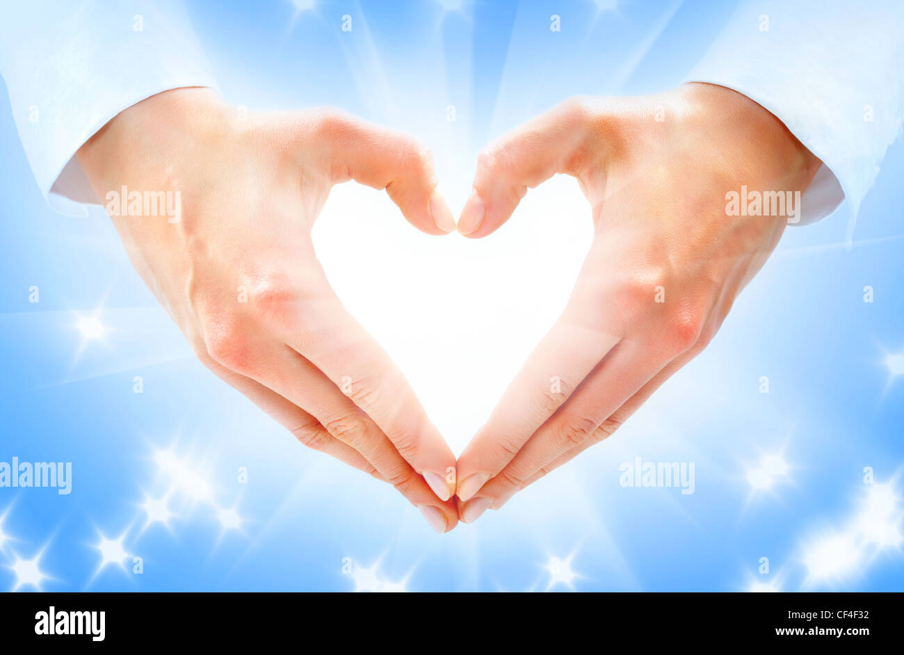 Hands Forming A Heart Shape High Resolution Stock Photography and ...