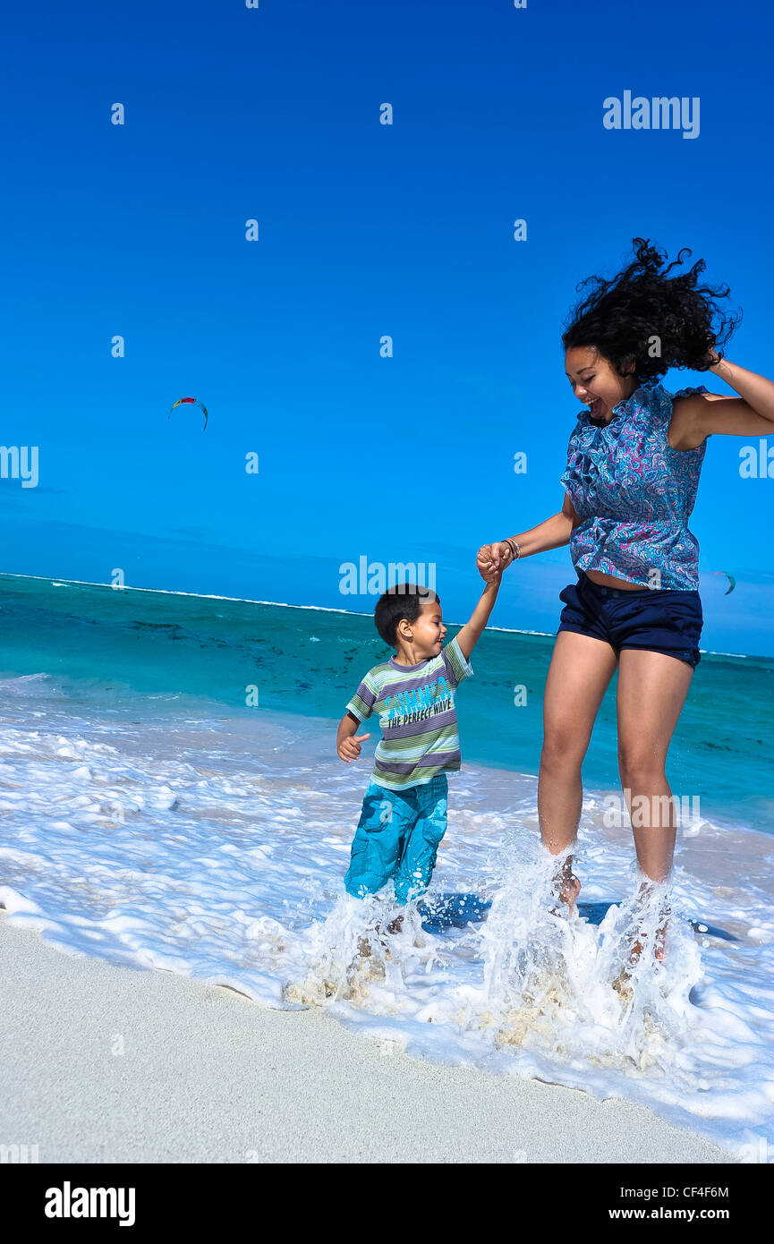 Child jumping to the water hi-res stock photography and images - Alamy