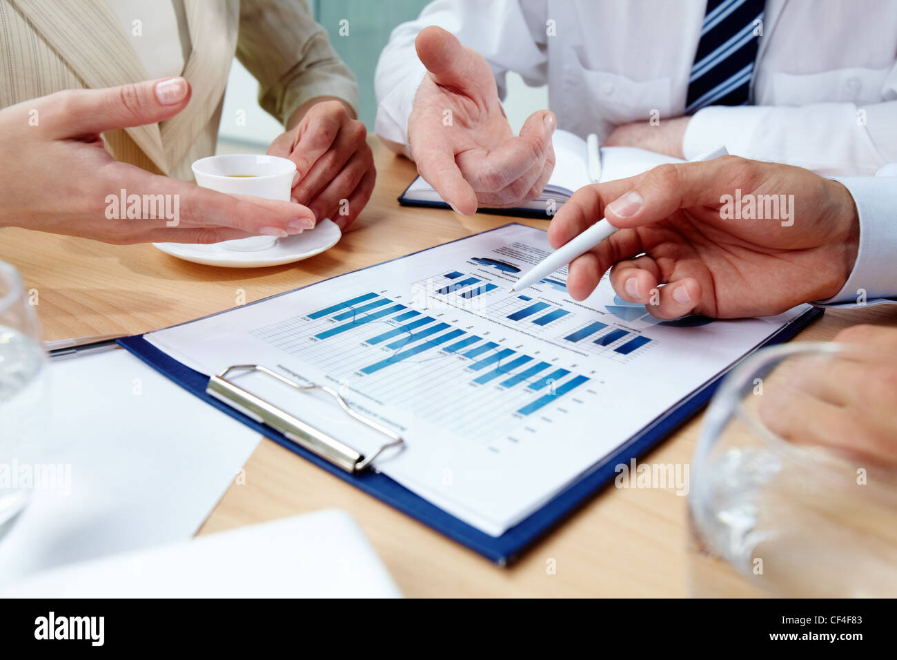 Business people in the middle of an important discussion Stock Photo ...