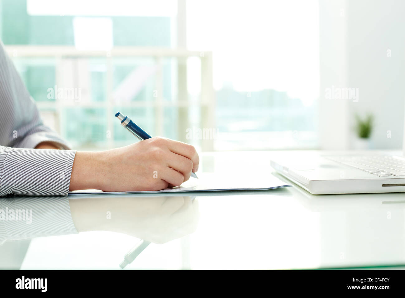 Business lady taking business notes at office Stock Photo - Alamy