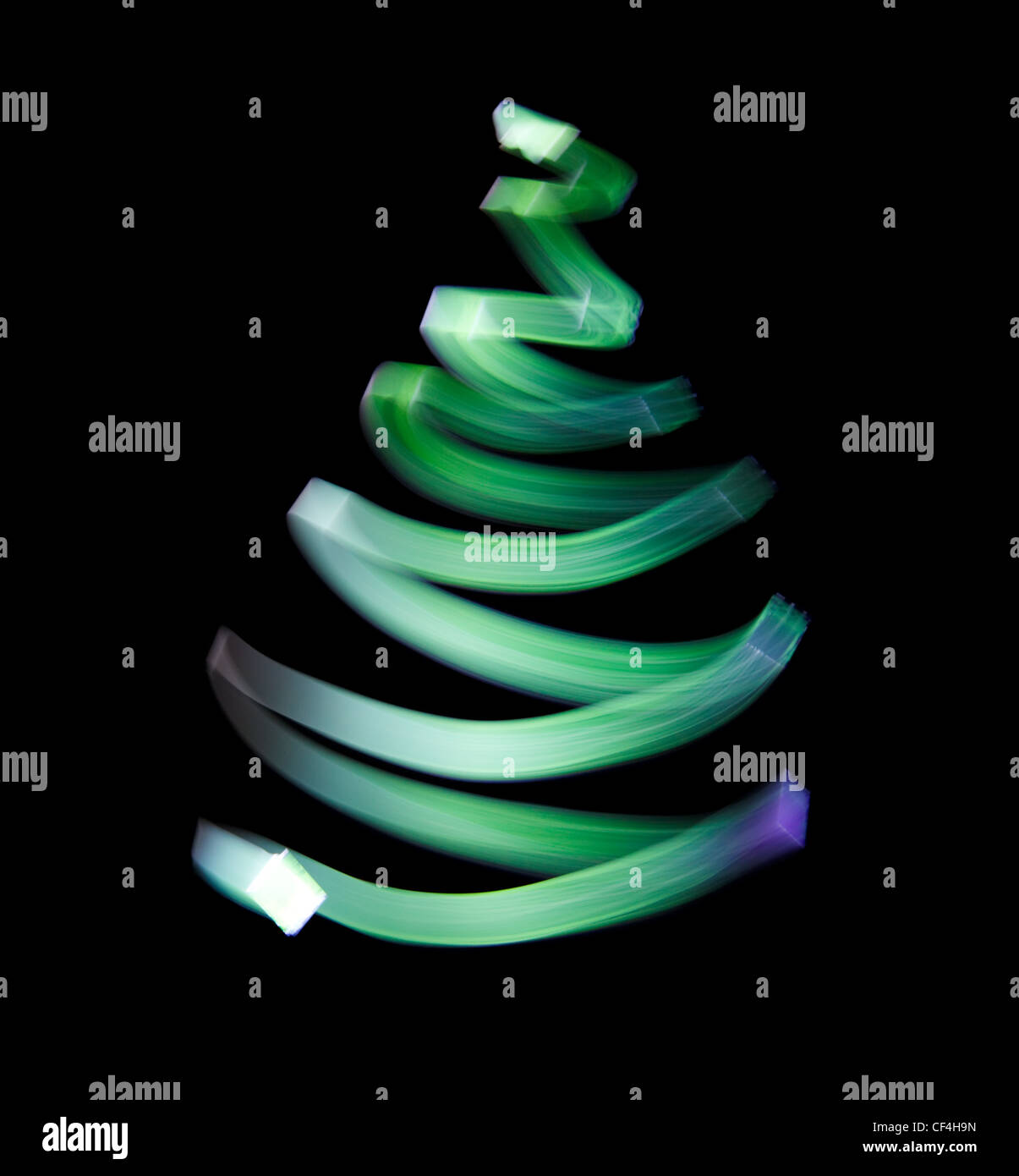 Shone green wavy trace. Symbol of Christmas trees Stock Photo - Alamy