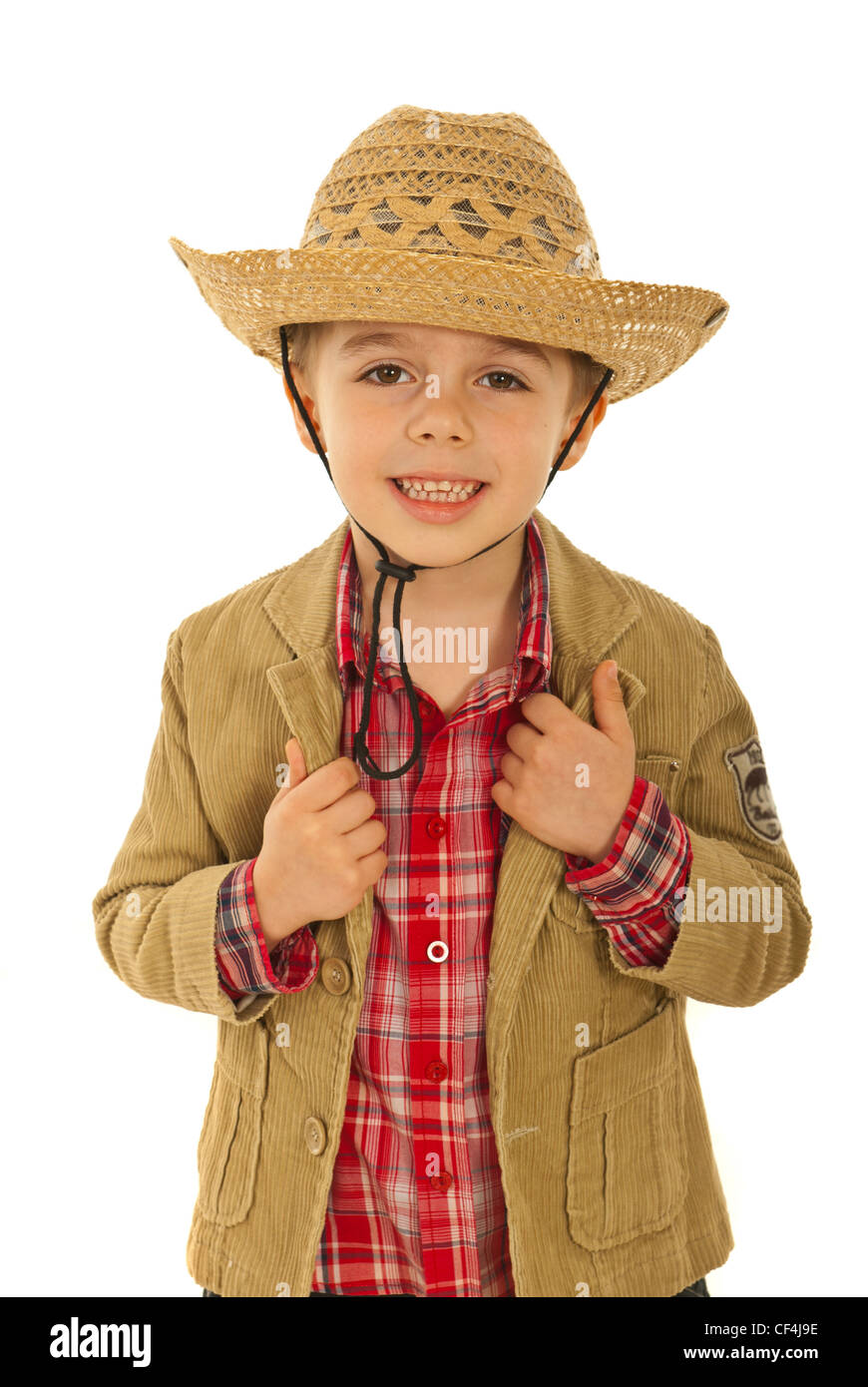 Happy fashion model kid wearing jacket ad cowboy hat isolated on white ...