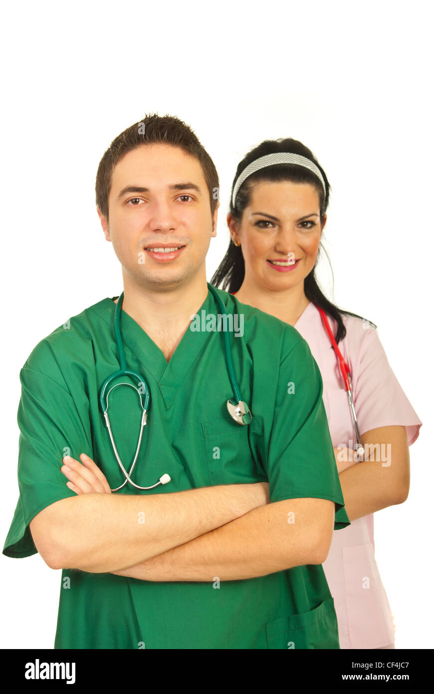 Happy health workers team standing with arms folded isolated on white ...