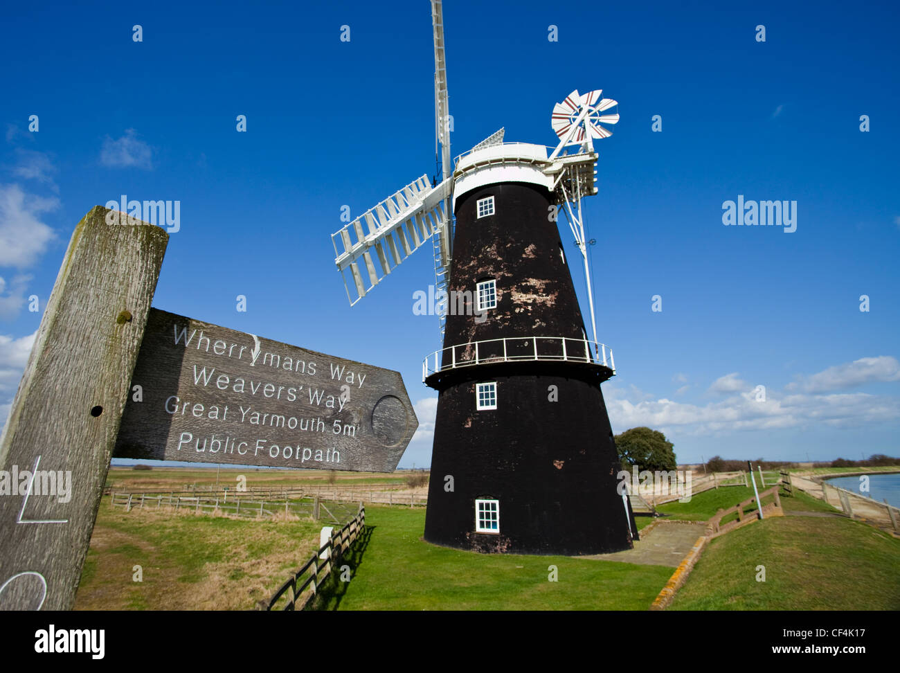 Berney Arms drainage mill and sign on the Norfolk Broads Stock Photo ...