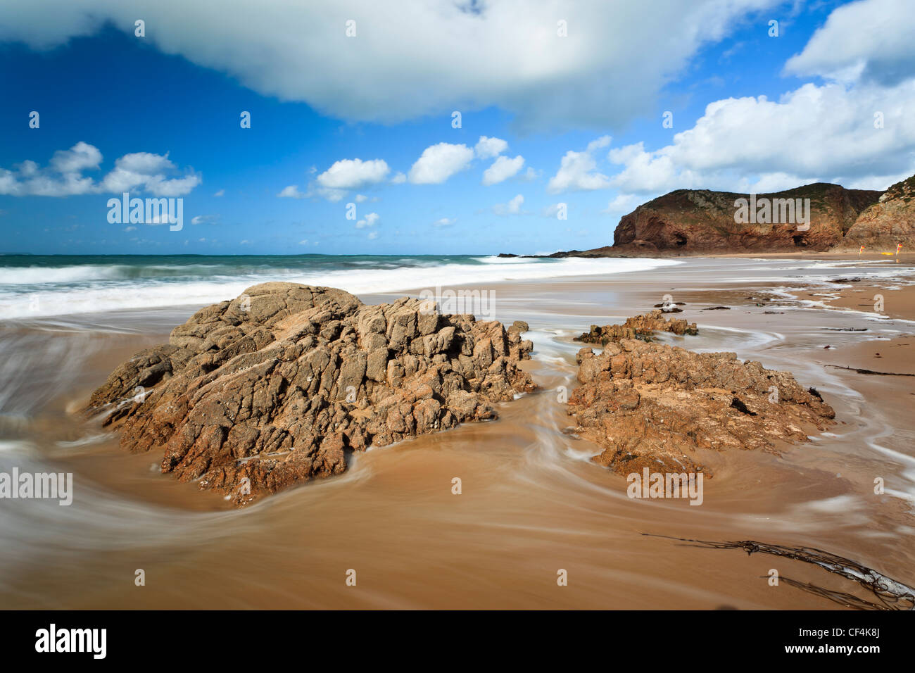 Tide pools with seaweed on the sandy beach hi-res stock photography and ...
