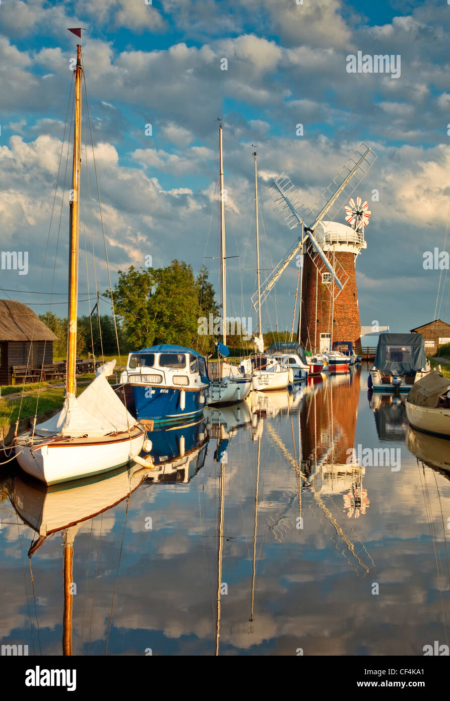 Relections of Horsey Windpump and boats in Horsey Mere on the Norfolk ...