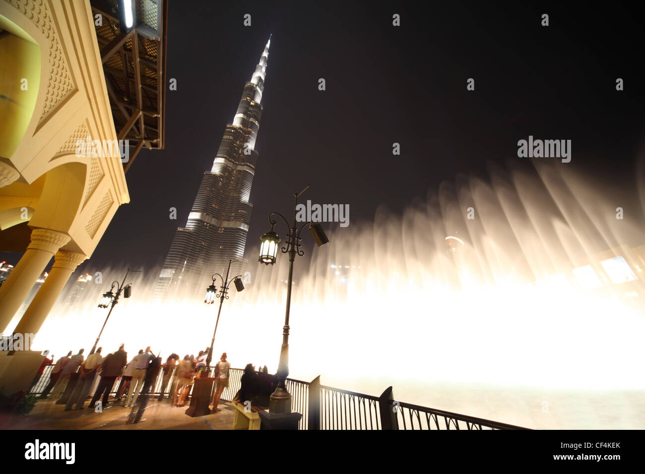 Burj Dubai skyscraper and fountain turned on night time general view ...