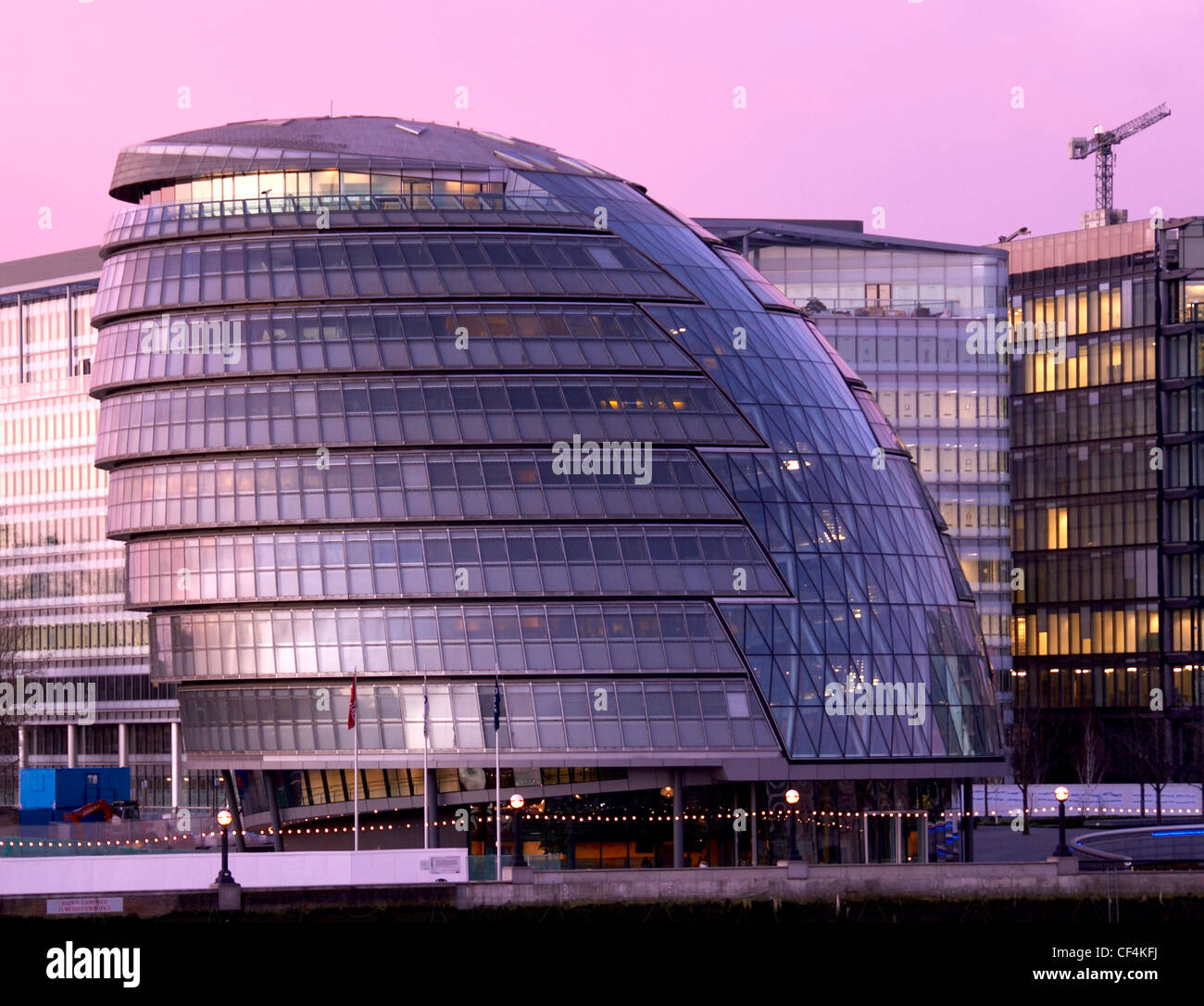 City Hall at sunrise. This building is home to the Mayor of London, the ...