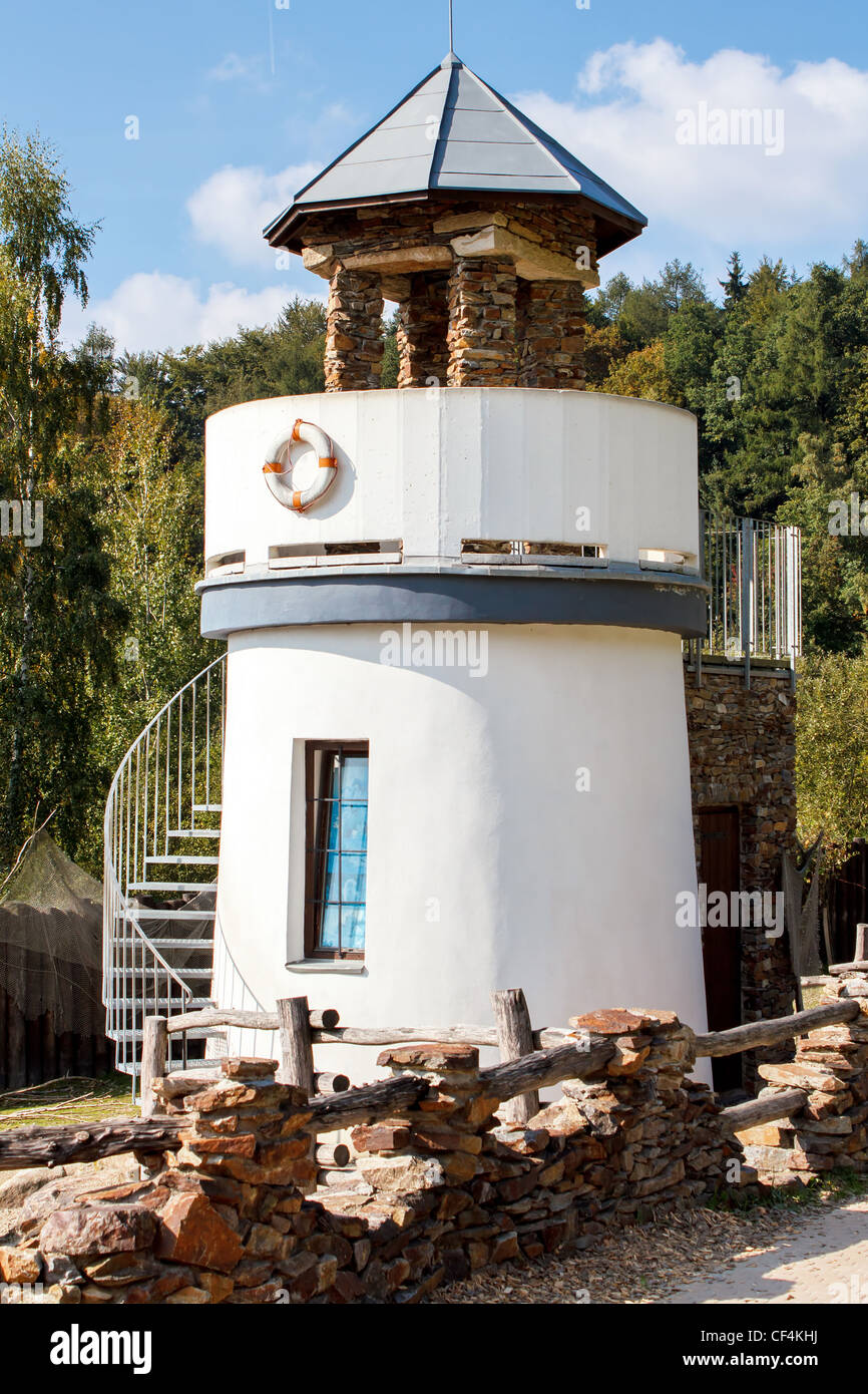 small lighthouse for childs play in park Stock Photo - Alamy