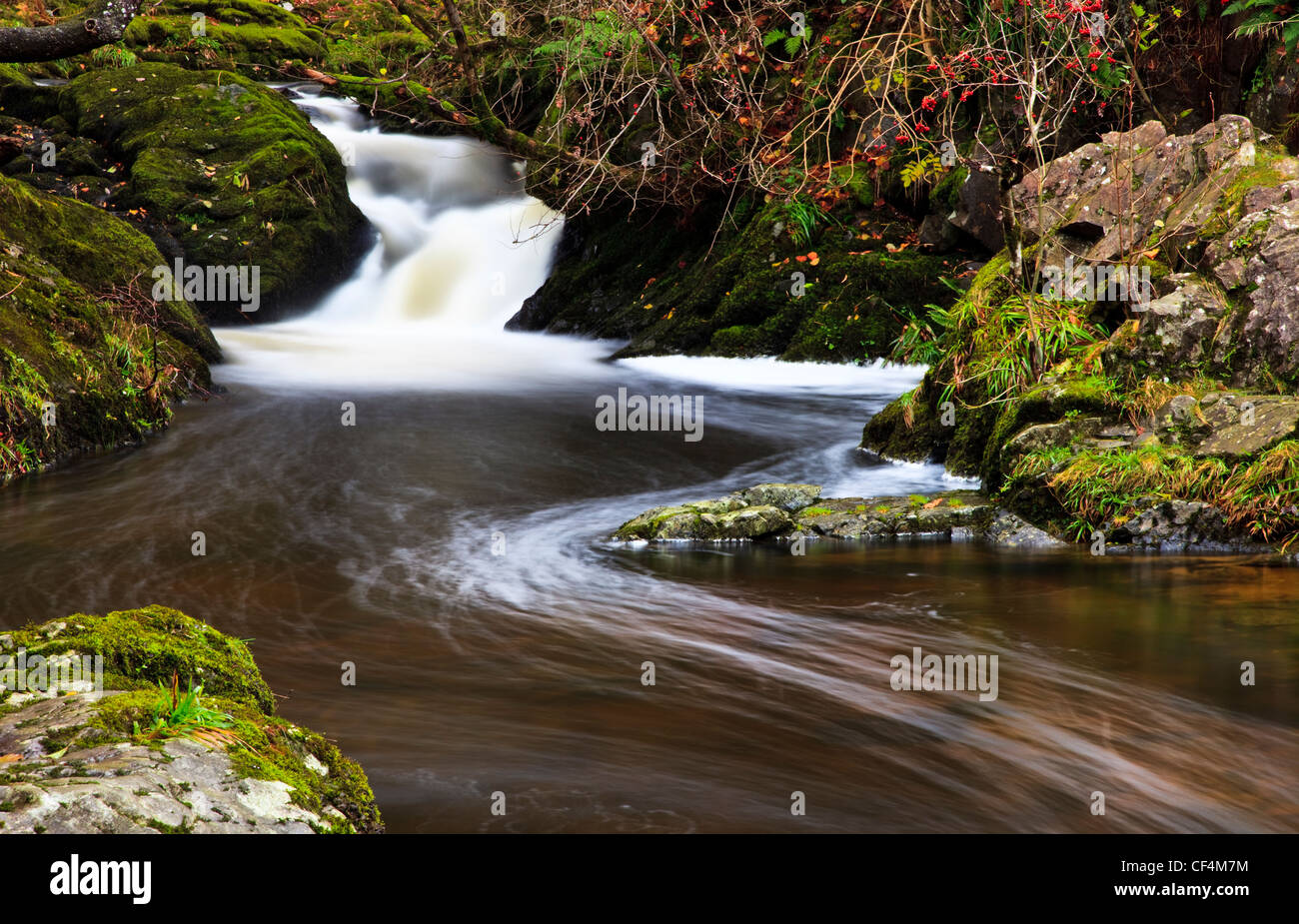 Water flowing in a stream in the Lake District Stock Photo - Alamy