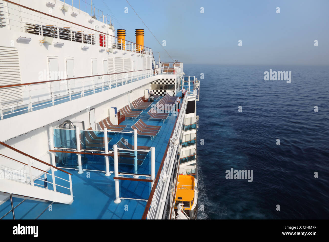 cruise ship deck with blue floor in ocean view from above Stock Photo ...