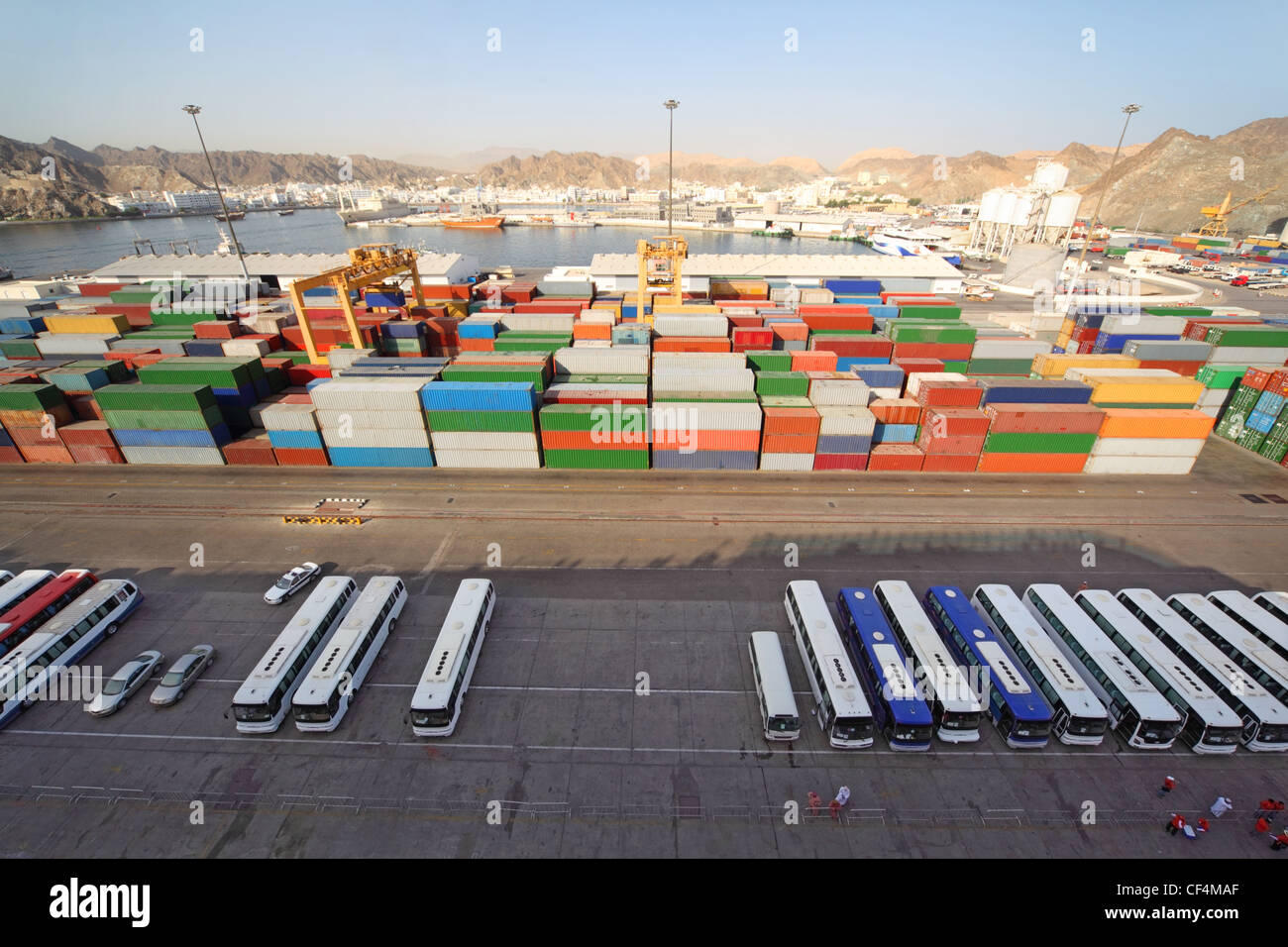 shipping port with buses and containers for cargo transportation view ...