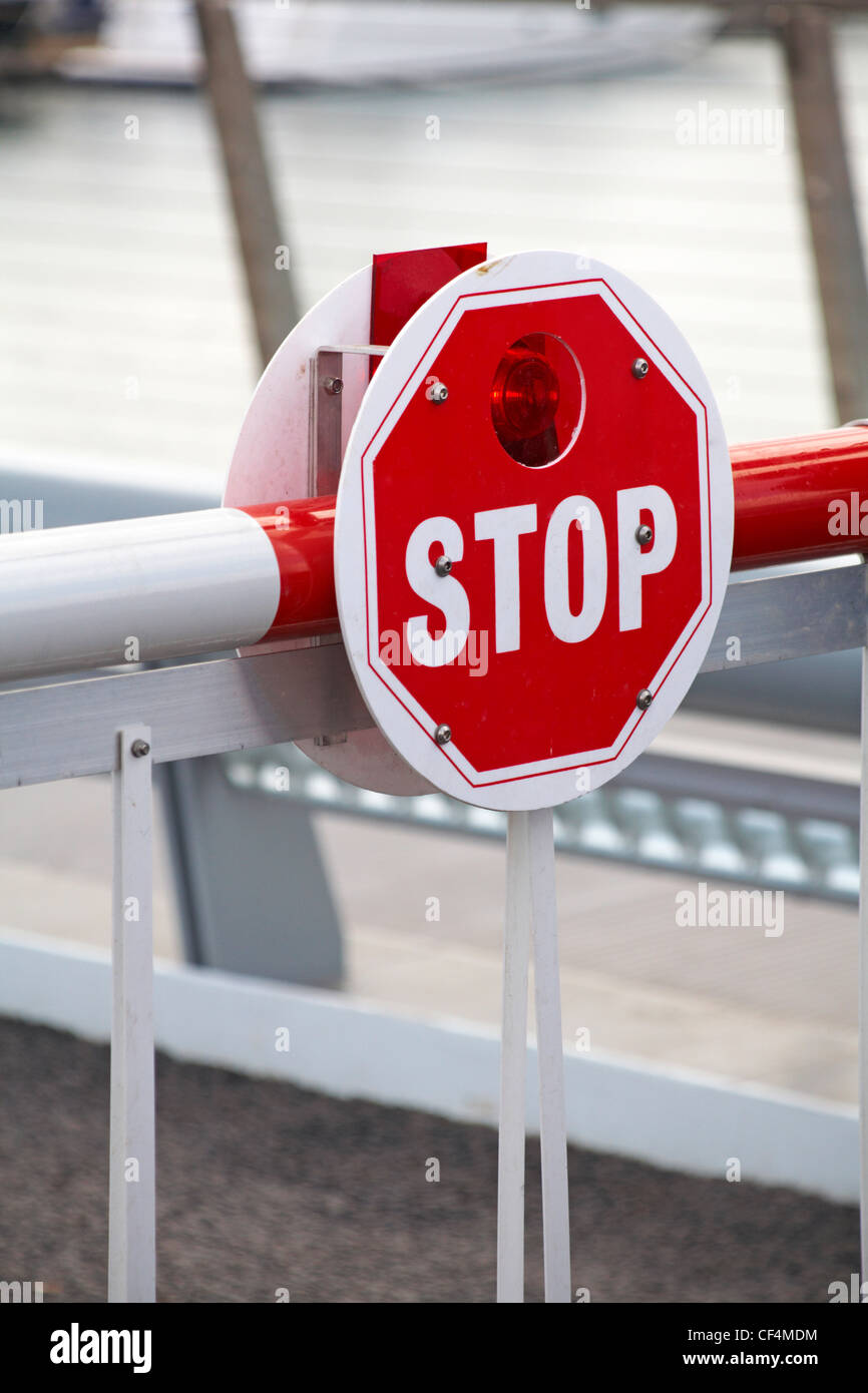 stop sign on barrier of bridge at the opening of the new twin sails ...