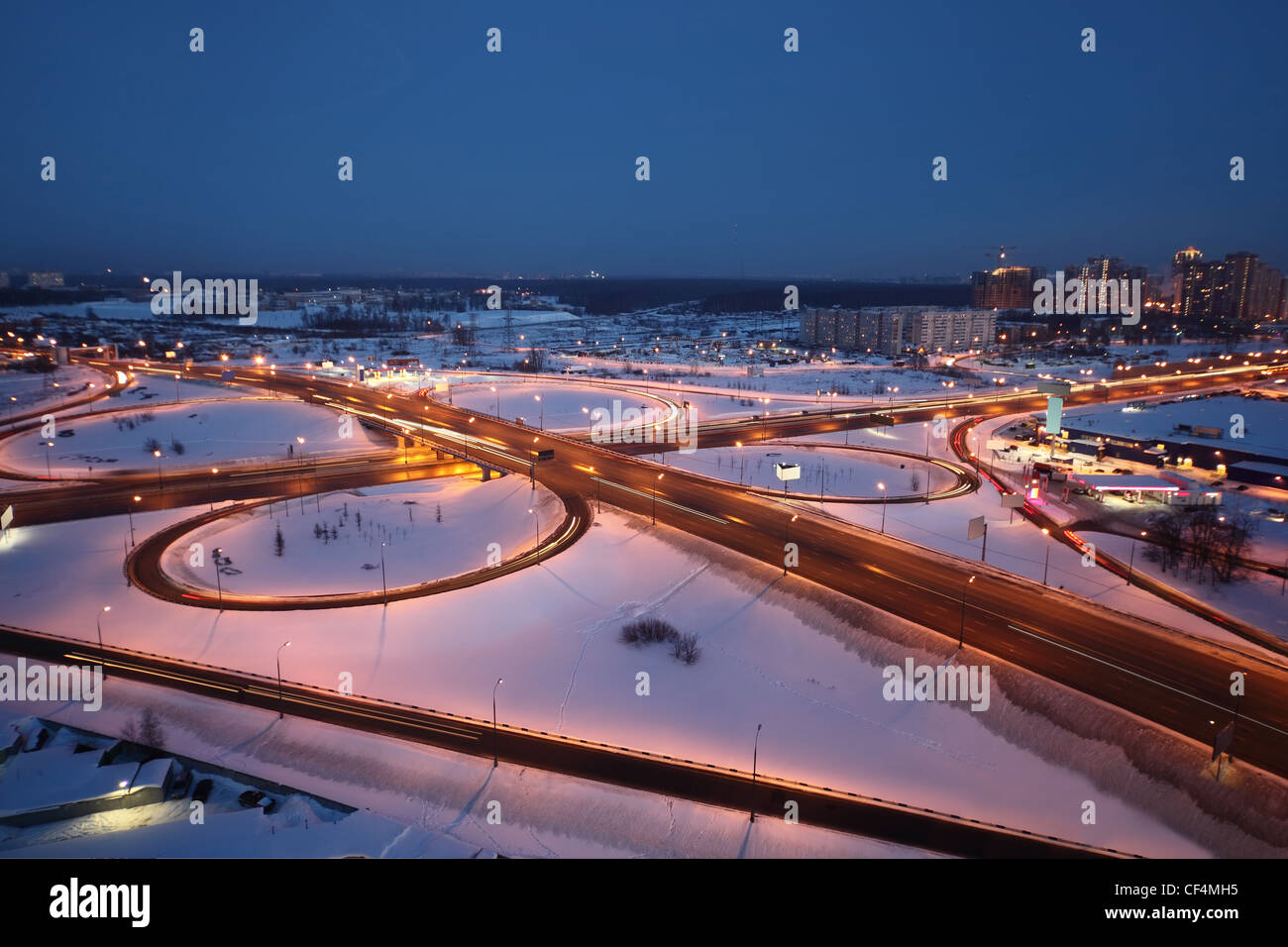 night winter cityscape with big interchange and lighting columns Stock ...