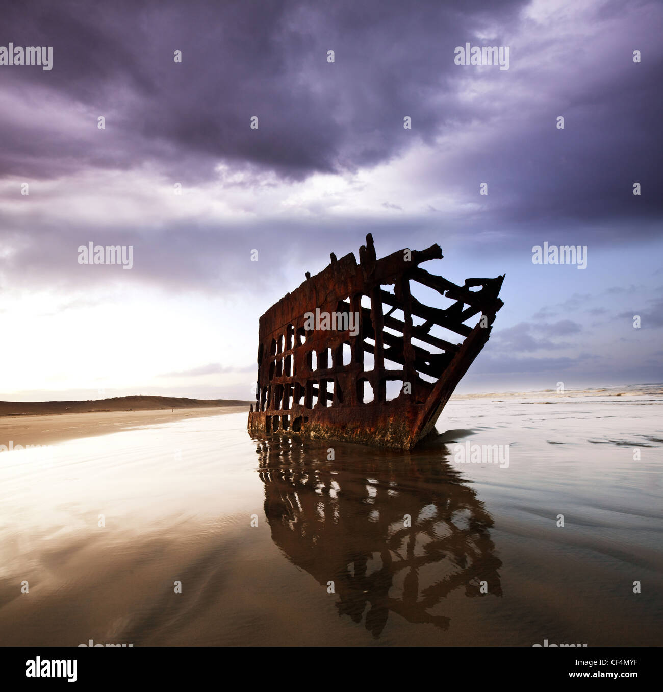 Shipwreck at sunset on beach .Fort Stevens State Park ,Oregon,USA Stock ...