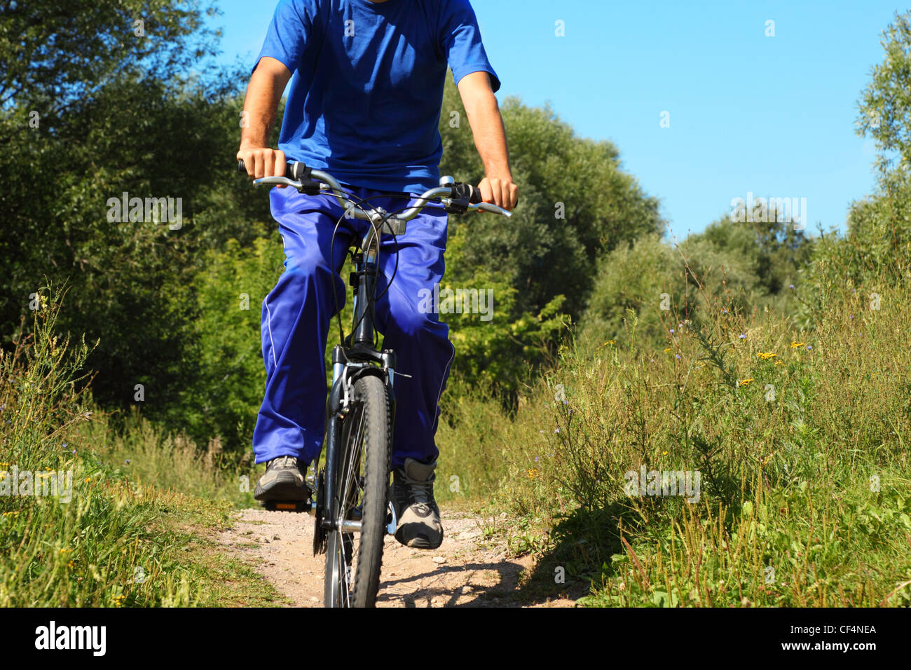 Man with bycicle hi-res stock photography and images - Alamy