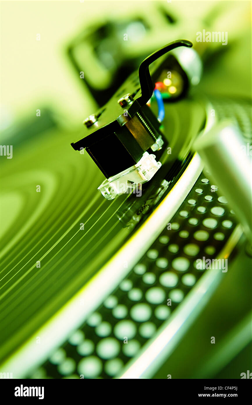 Record player spinning the disc with music Stock Photo - Alamy