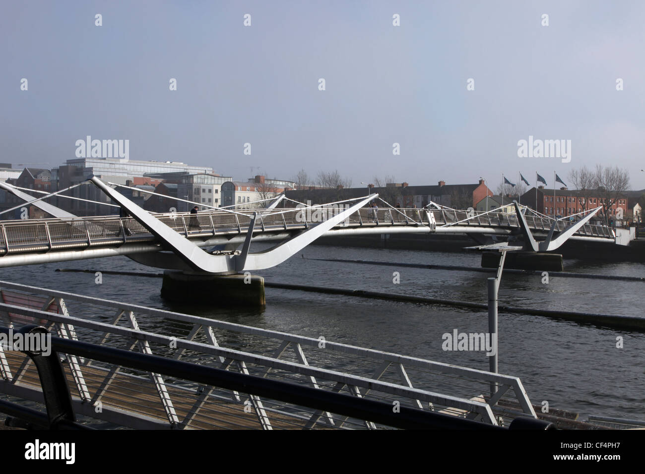 The Millennium Bridge, a pedestrian bridge over the River Liffey ...