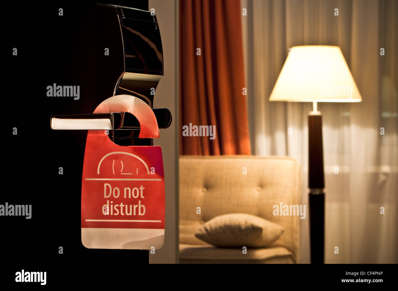 This is a photograph of a do not disturb sign Stock Photo - Alamy
