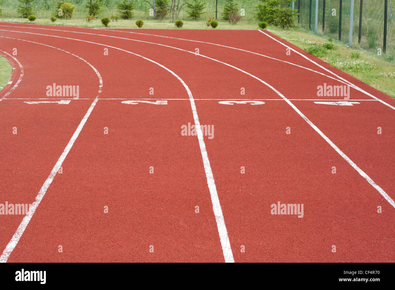 lanes of a red race track, photo outdoors Stock Photo - Alamy