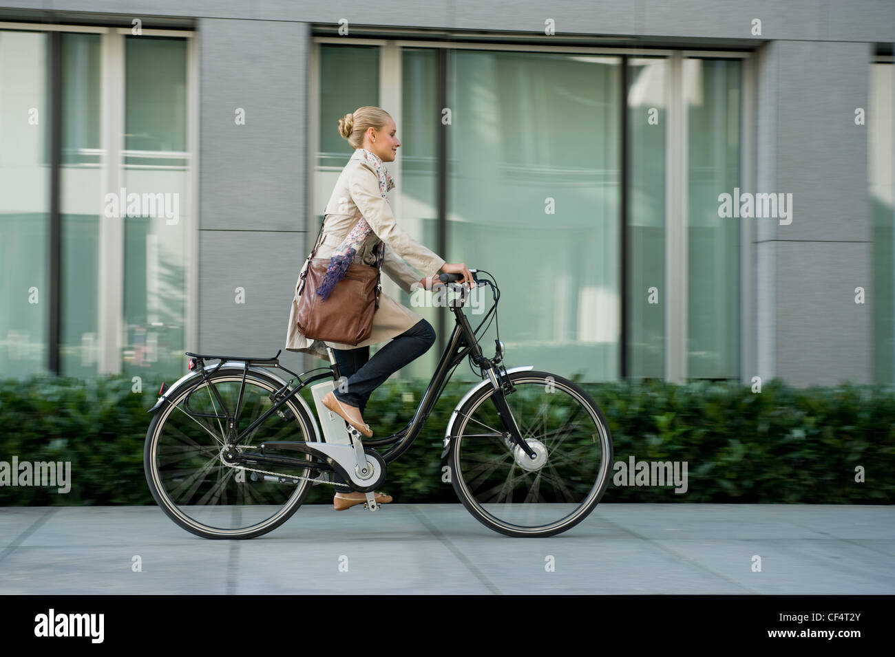 Germany, Bavaria, Teenage girl riding bicycle Stock Photo - Alamy