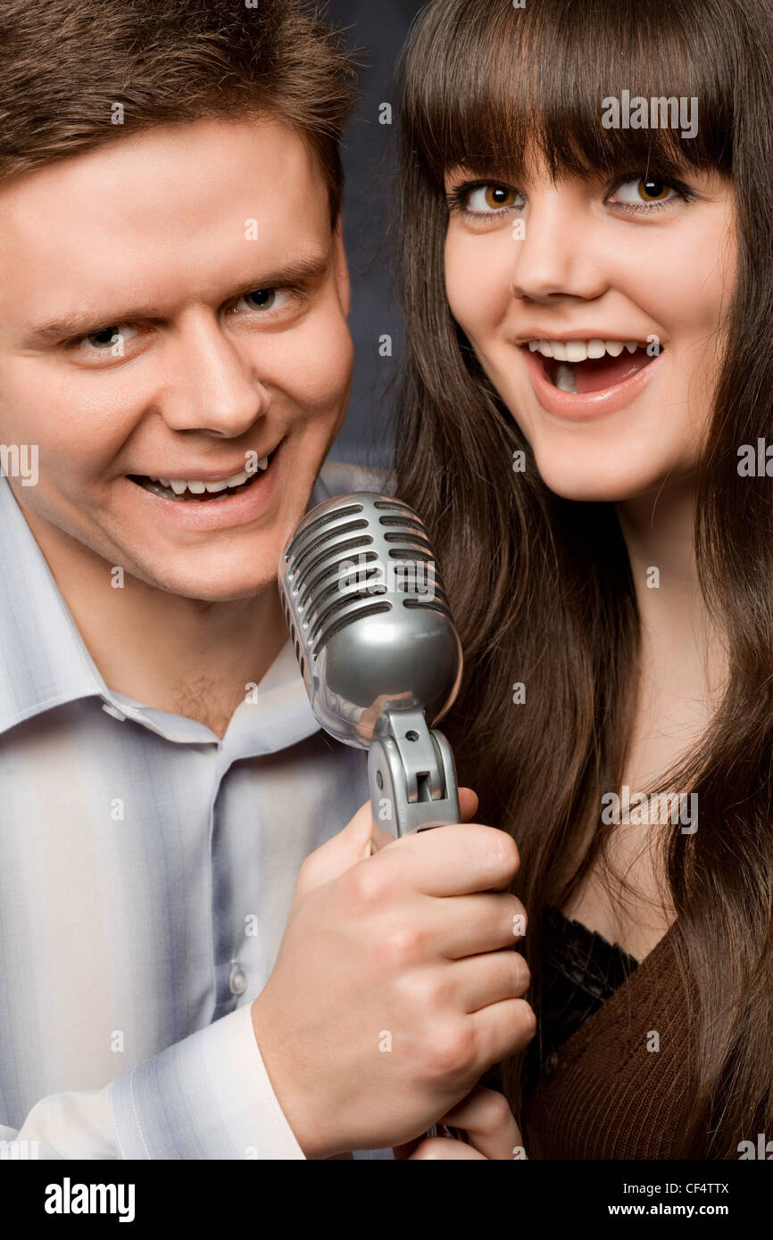 Cheerful beautiful singer recording hi-res stock photography and images ...