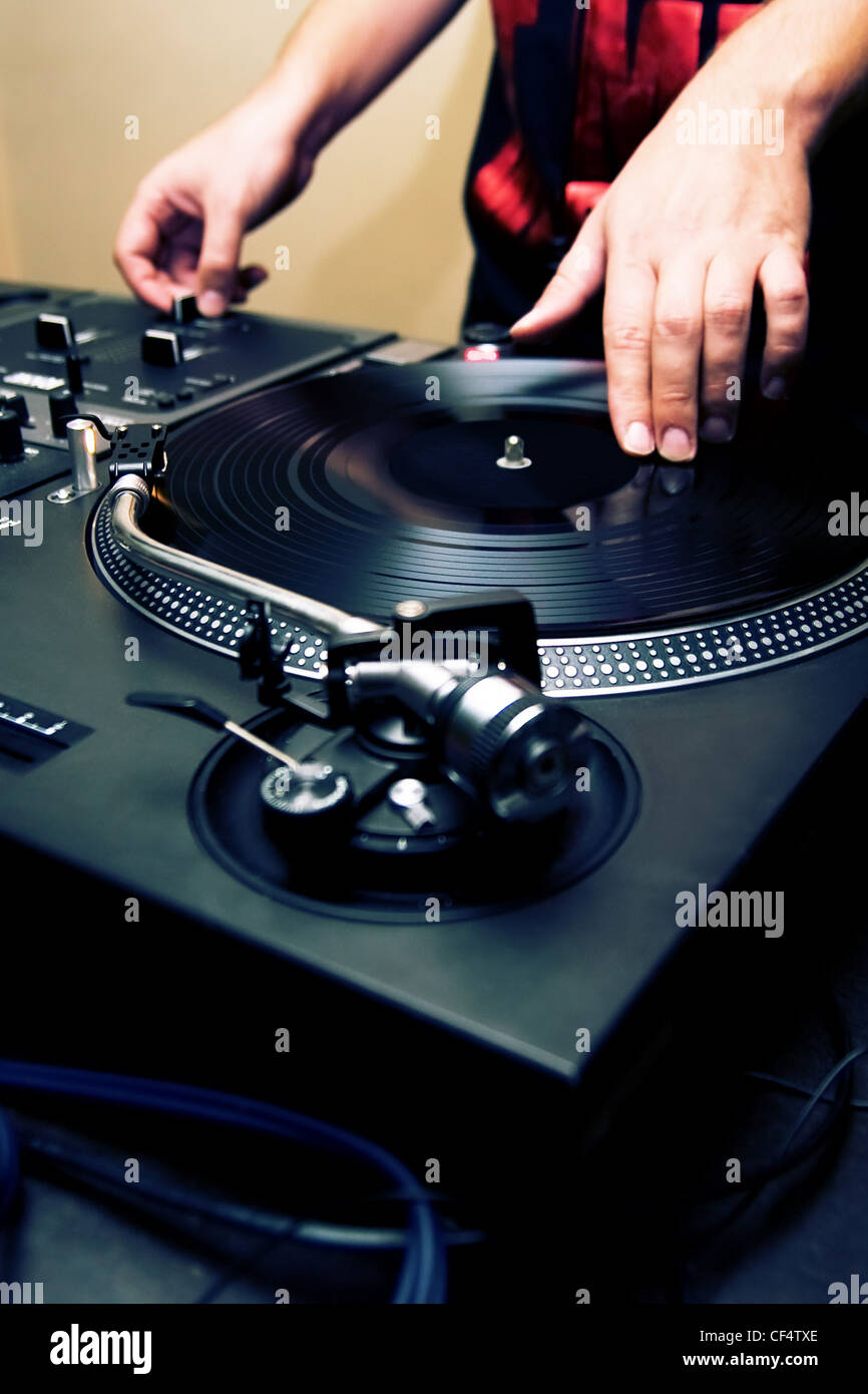 Dj mixing vinyl records scratching hi-res stock photography and images ...
