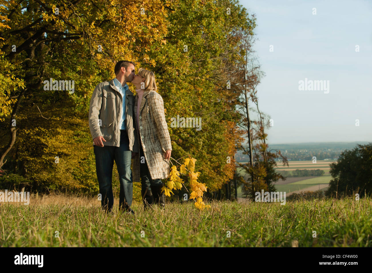Germany, Bavaria, Couple kissing Stock Photo - Alamy