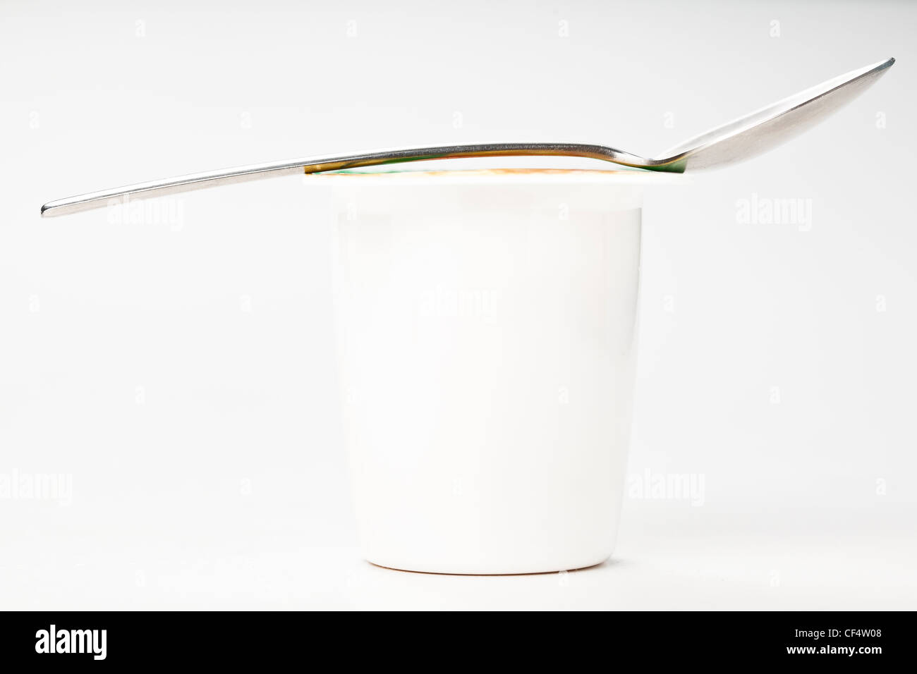 yogurt in plastic box container over white background Stock Photo - Alamy