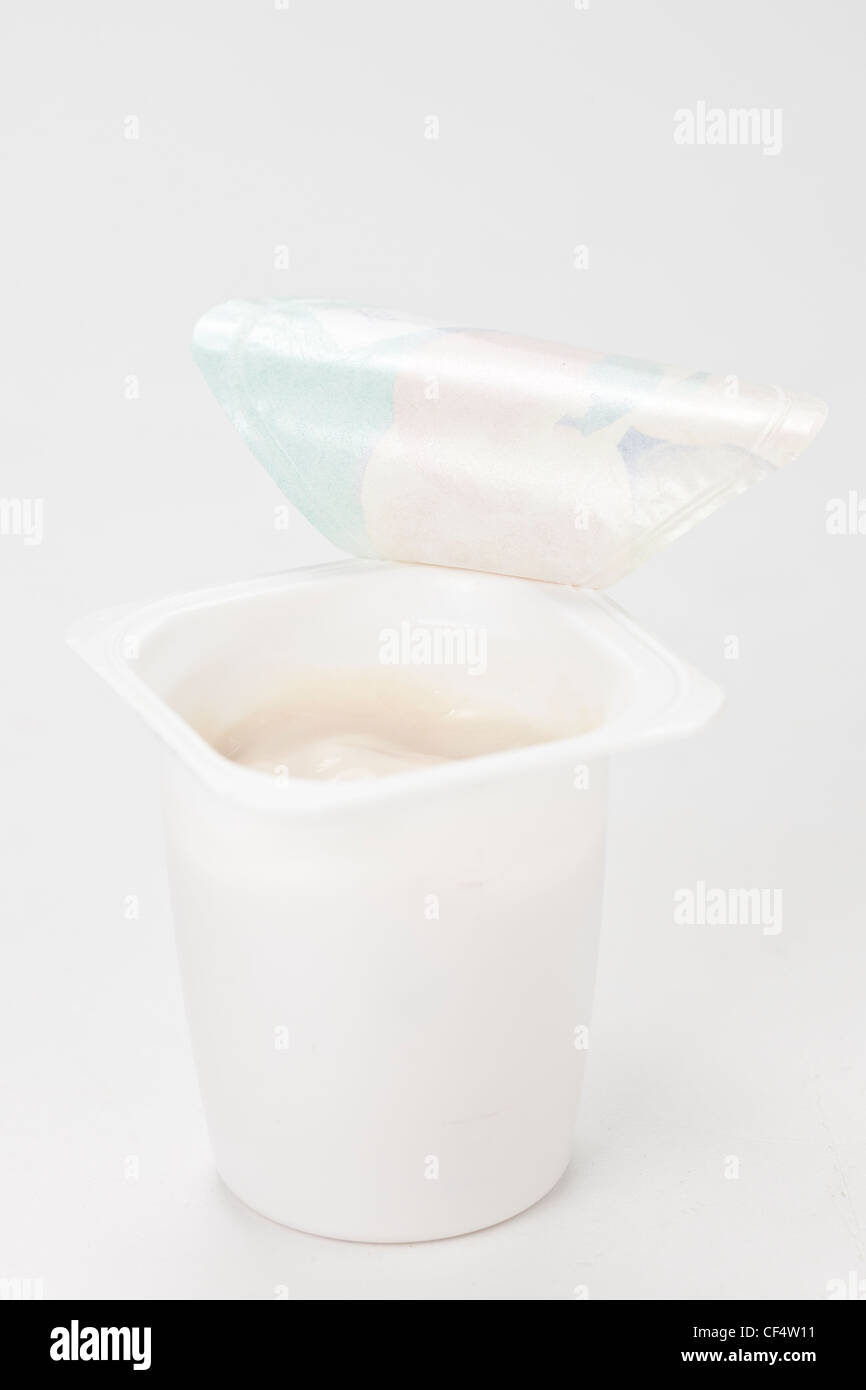 yogurt in plastic box container over white background Stock Photo - Alamy