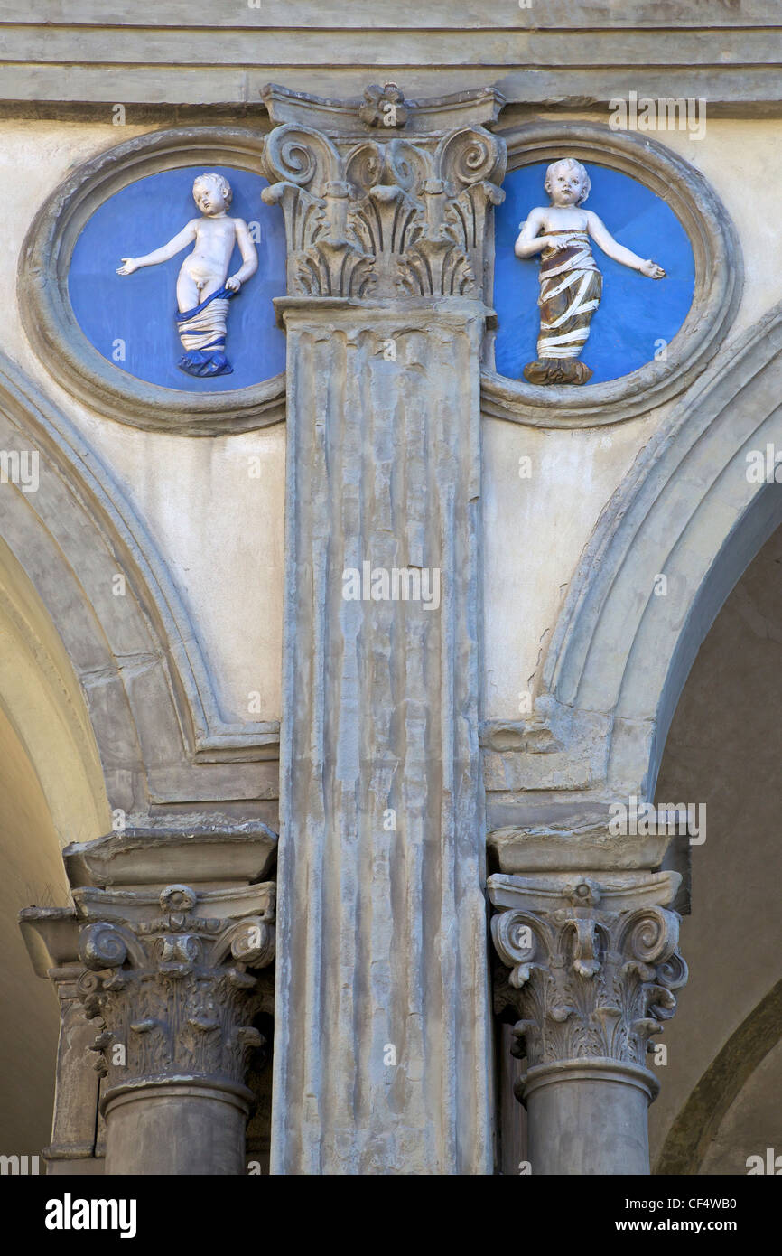 Terracotta roundels of babies in swaddling clothes, by Andrea della ...