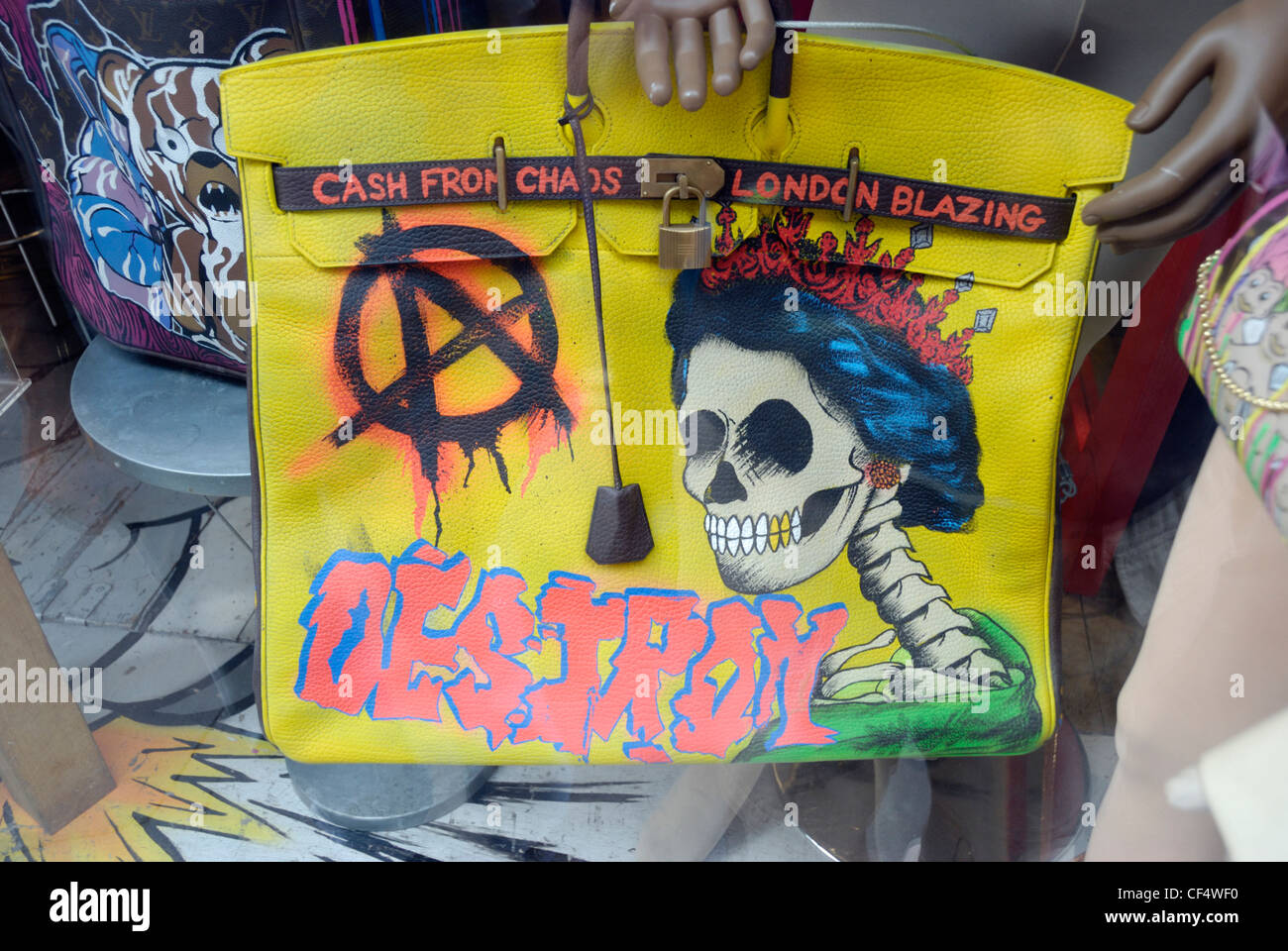 'Cash from Chaos' anarchic 'punk' handbag in a London shop window Stock ...