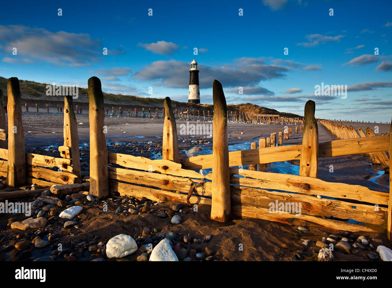 Sea defences and the disused lighthouse at Spurn Point (Spurn Head) on ...