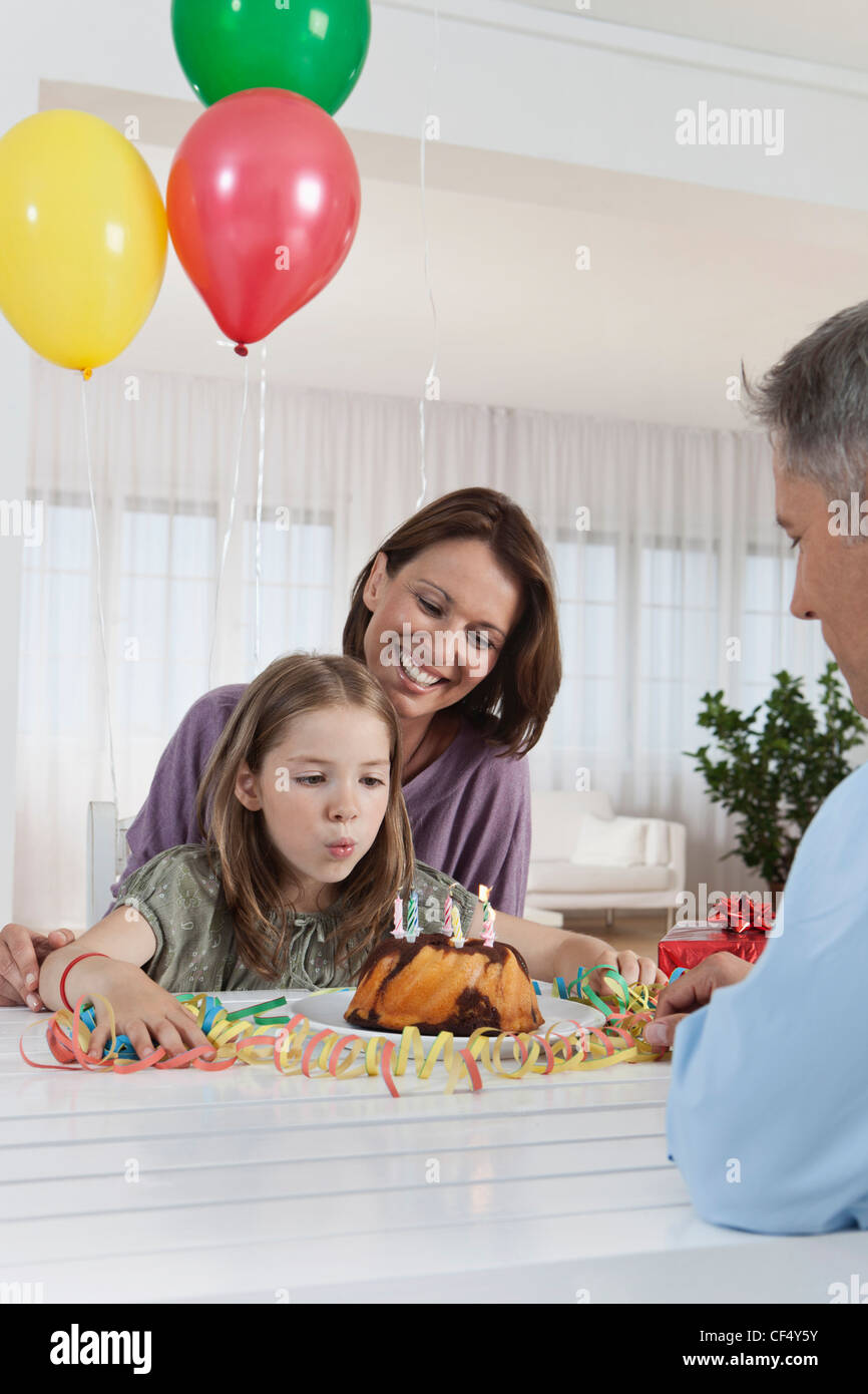 Germany, Munich, Family celebrating birthday, smiling Stock Photo - Alamy