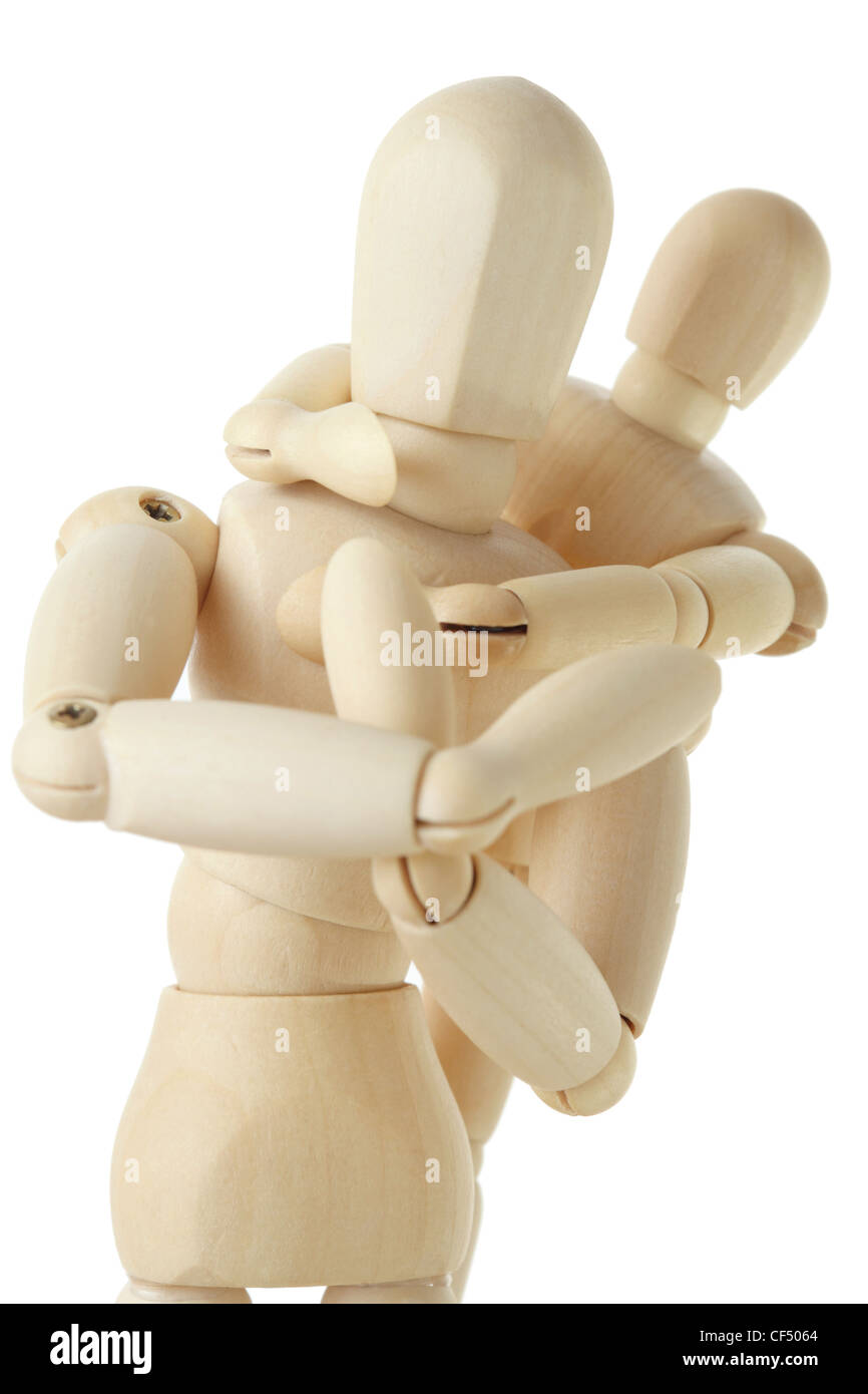 wooden figures of child embracing his parent from back, half body ...