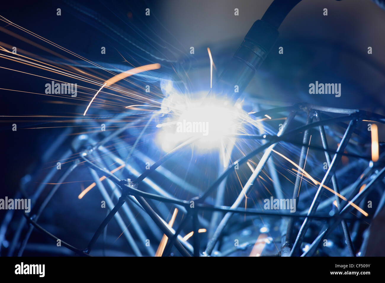 Germany, Upper Bavaria, Munich, Schaeftlarn, Welding torch at work ...