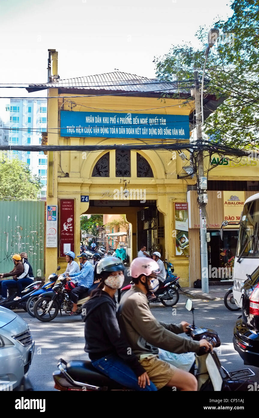 "The Refinery" restaurant archway and mopeds, Ho Chi Minh City, Vietnam ...
