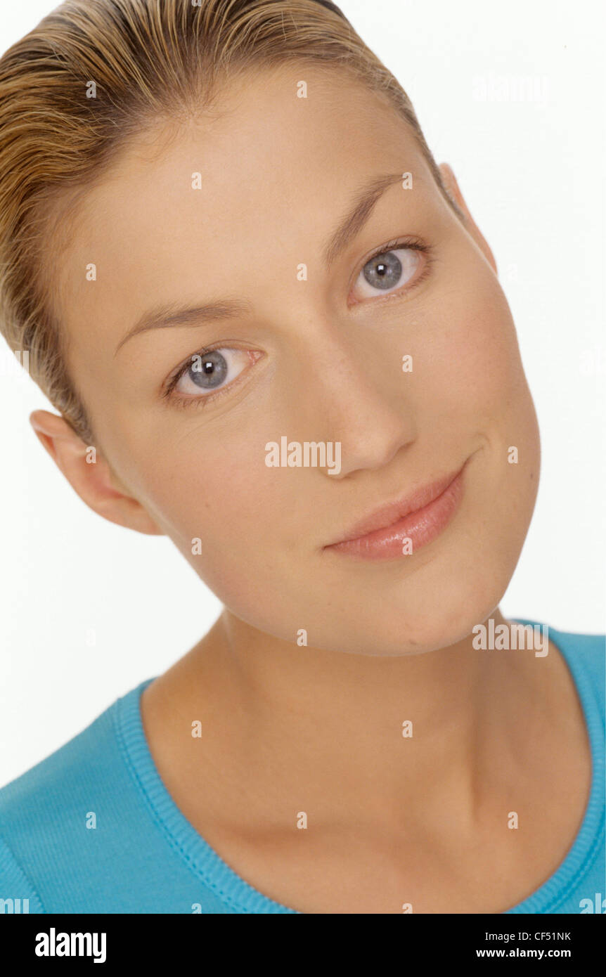 A blonde Female with hair pulled back looking at the camera Stock Photo ...