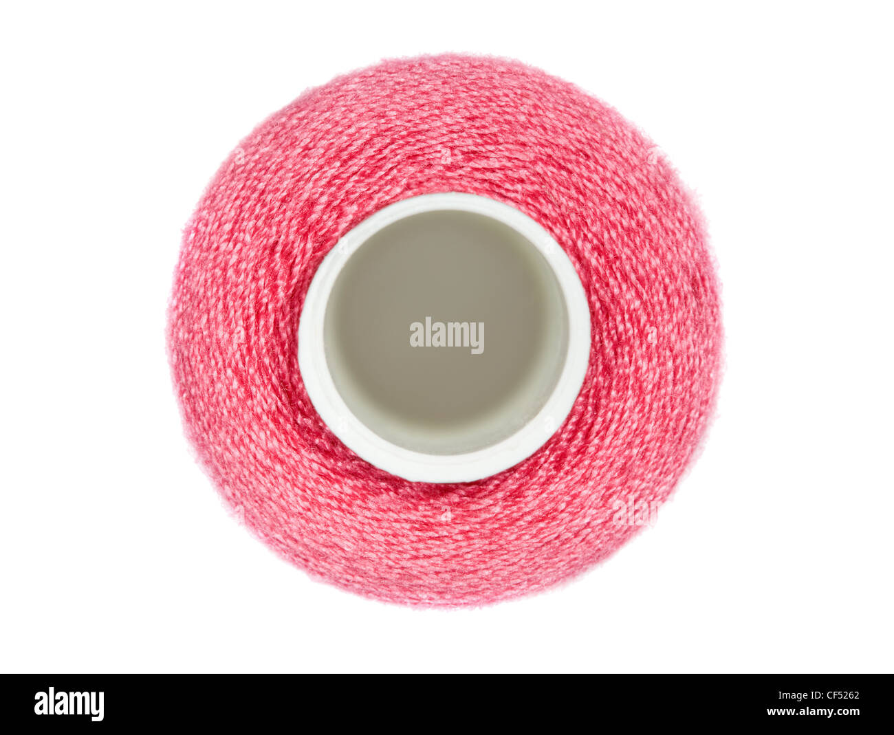 coil with red sewing threads isolated on white background, top view ...