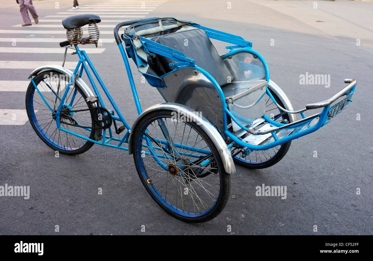 Blue rickshaw, Ho Chi Minh City, Vietnam Stock Photo - Alamy
