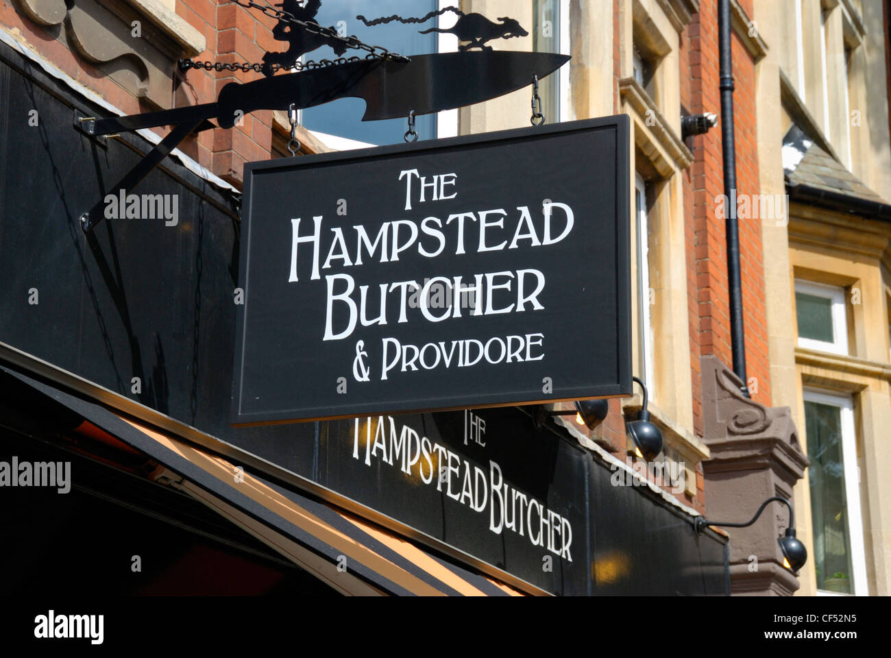 Traditional shop sign hanging outside hi-res stock photography and ...