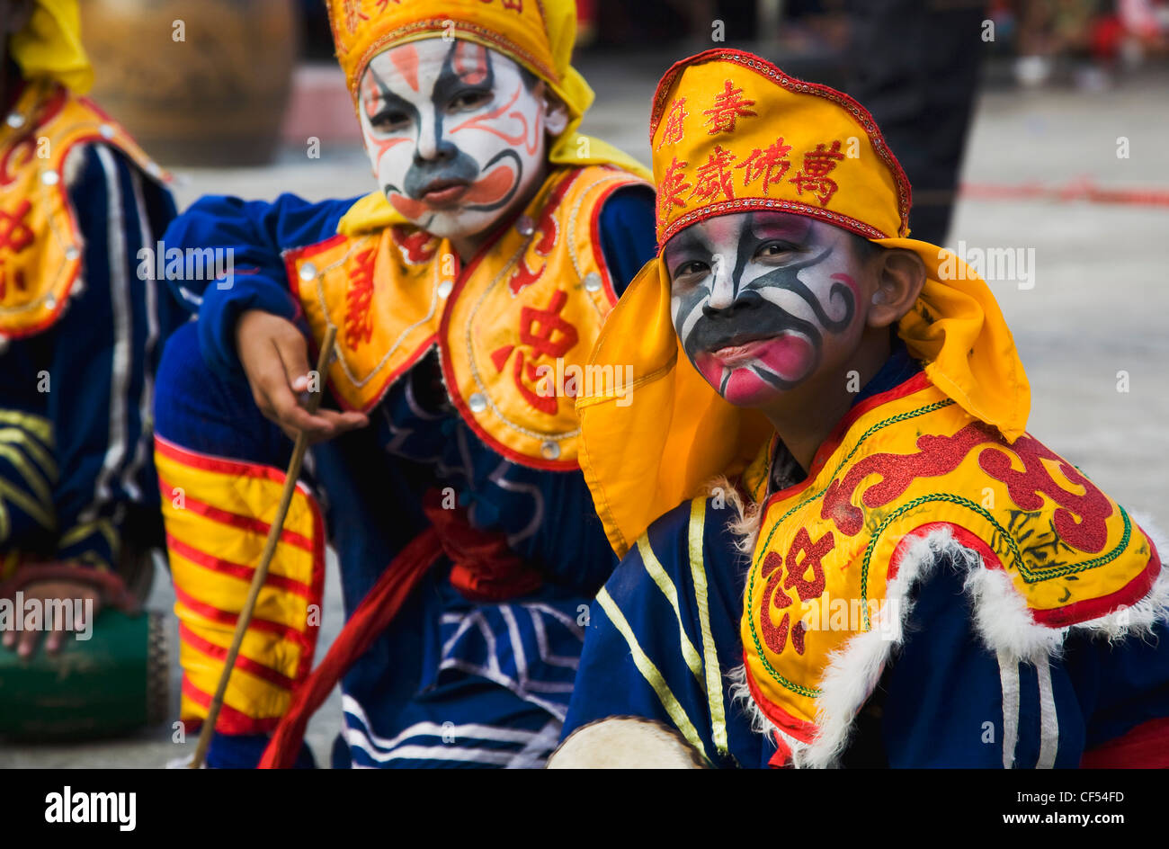 Thai boys in Chinese character costume in dance troupe celebrating ...