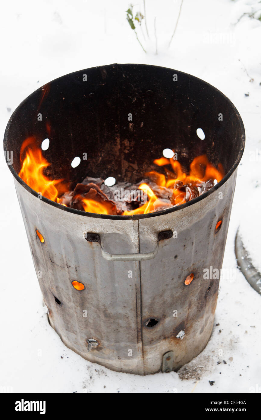 Burning waste in garden incinerator hi-res stock photography and images ...
