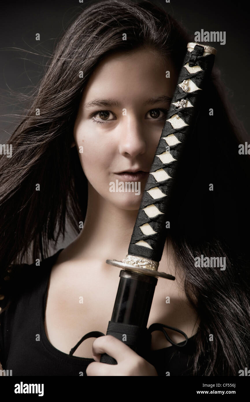 Woman with sword hi-res stock photography and images - Alamy