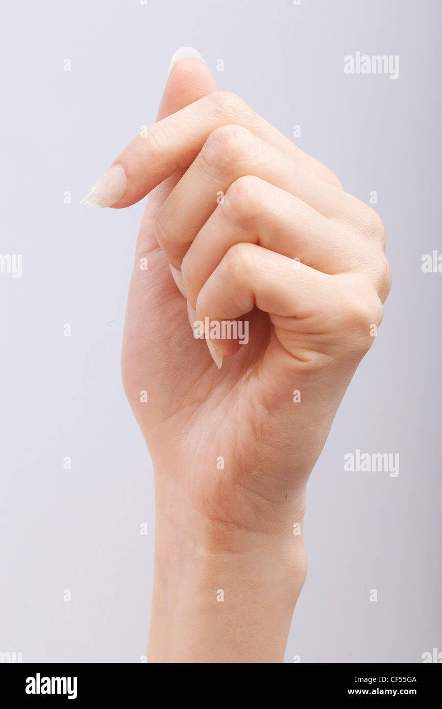 Female hand, clenched, fingernail broken Stock Photo - Alamy