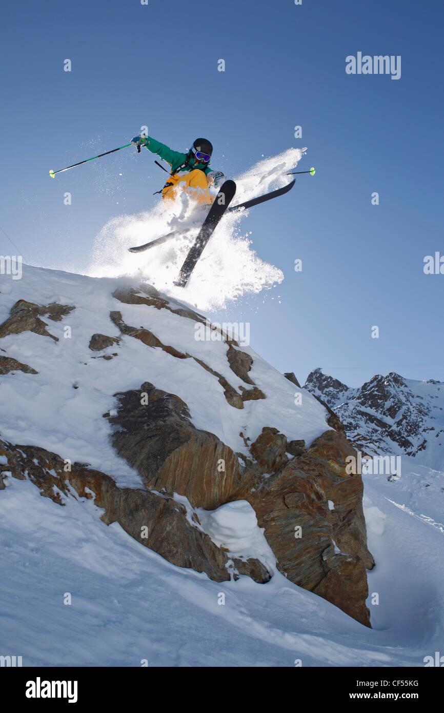 Austria, Tyrol, Pitztal, Mature man doing freestyle skiing Stock Photo ...