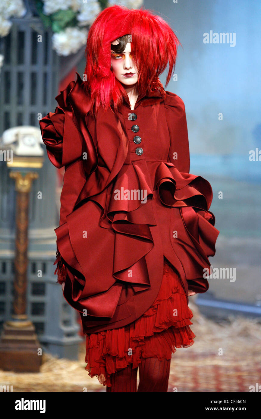 John Galliano Paris Ready to Wear Autumn Winter Model wearing red ...