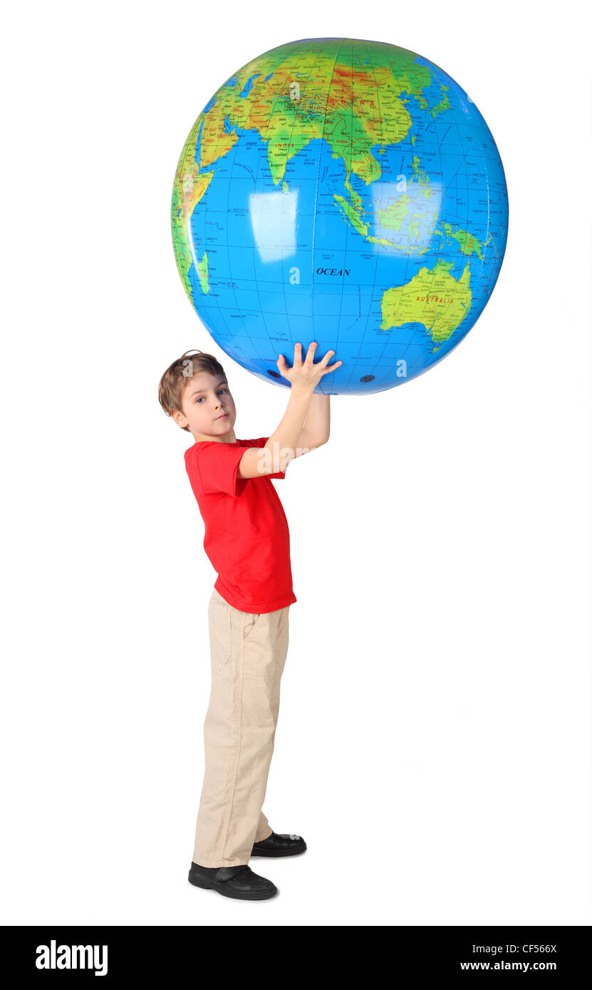 boy in red shirt holding big inflatable globe over his head side view ...