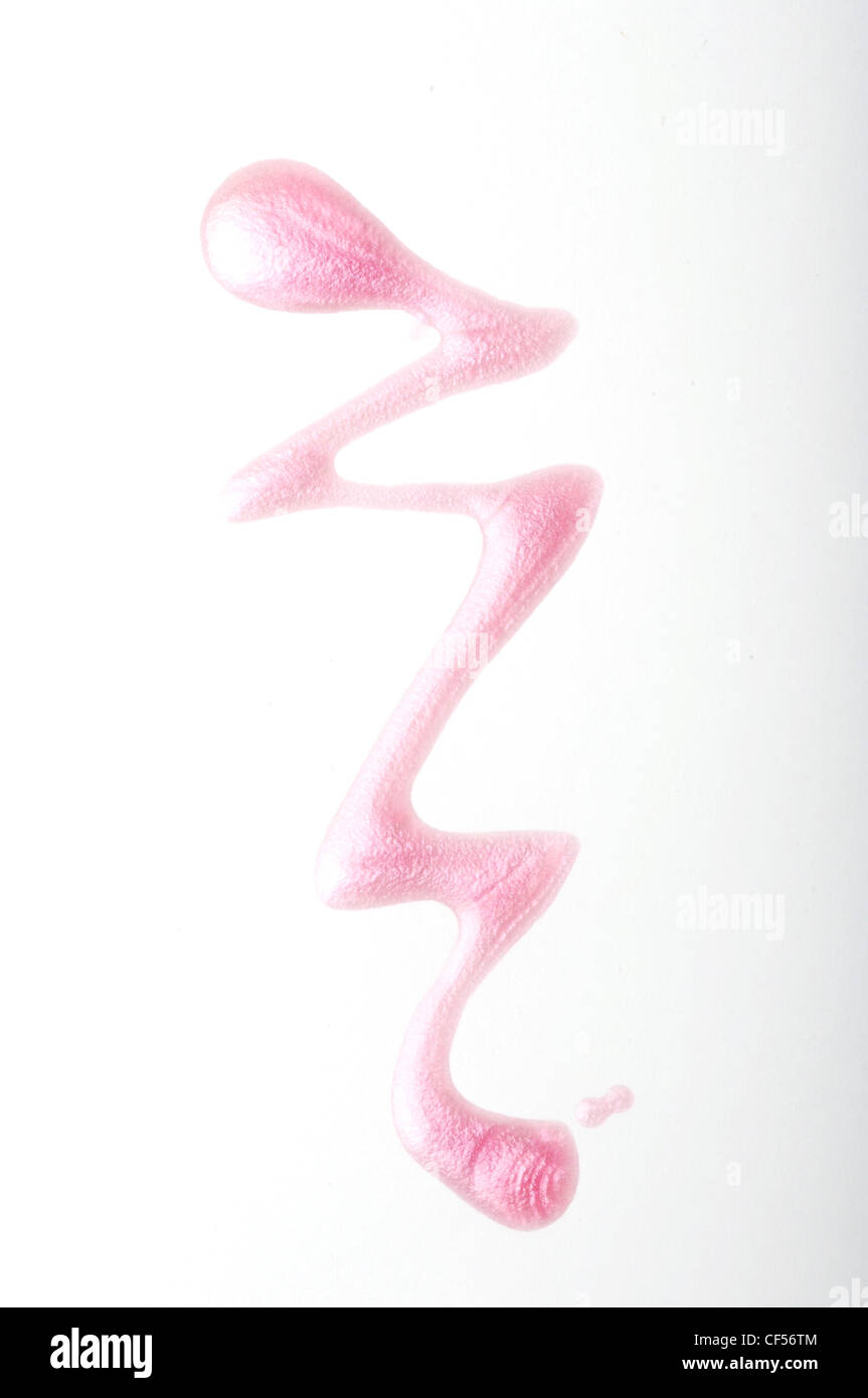 Drizzle of pale pink nail polish Stock Photo - Alamy